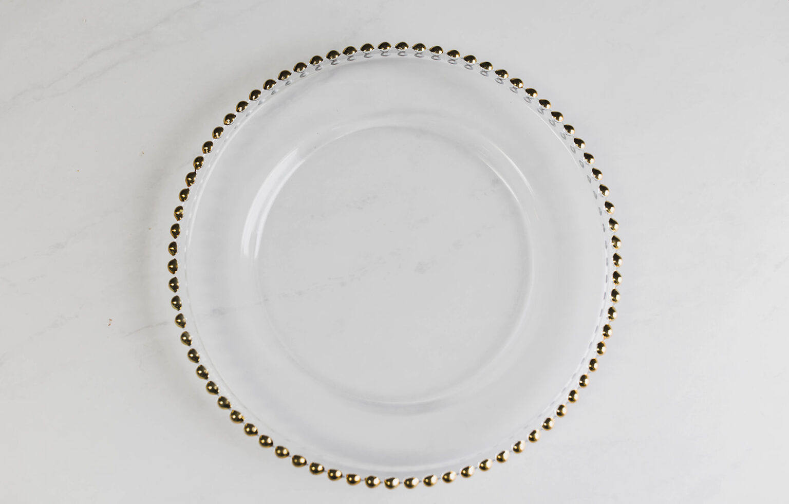 Glass Charger with Gold Beaded Rim Rental - A to Z Event Rentals, LLC.